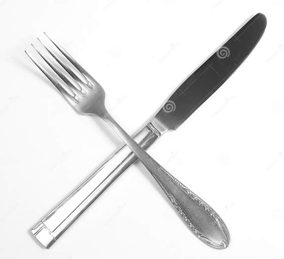 Crossing knife and fork stock image. Image of domestic - 7342093