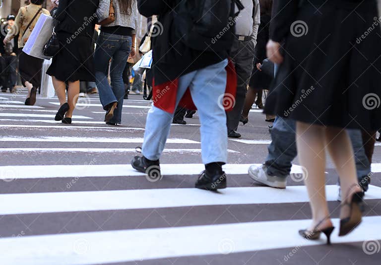 Crossing the street stock image. Image of crossing, clothes - 1420241