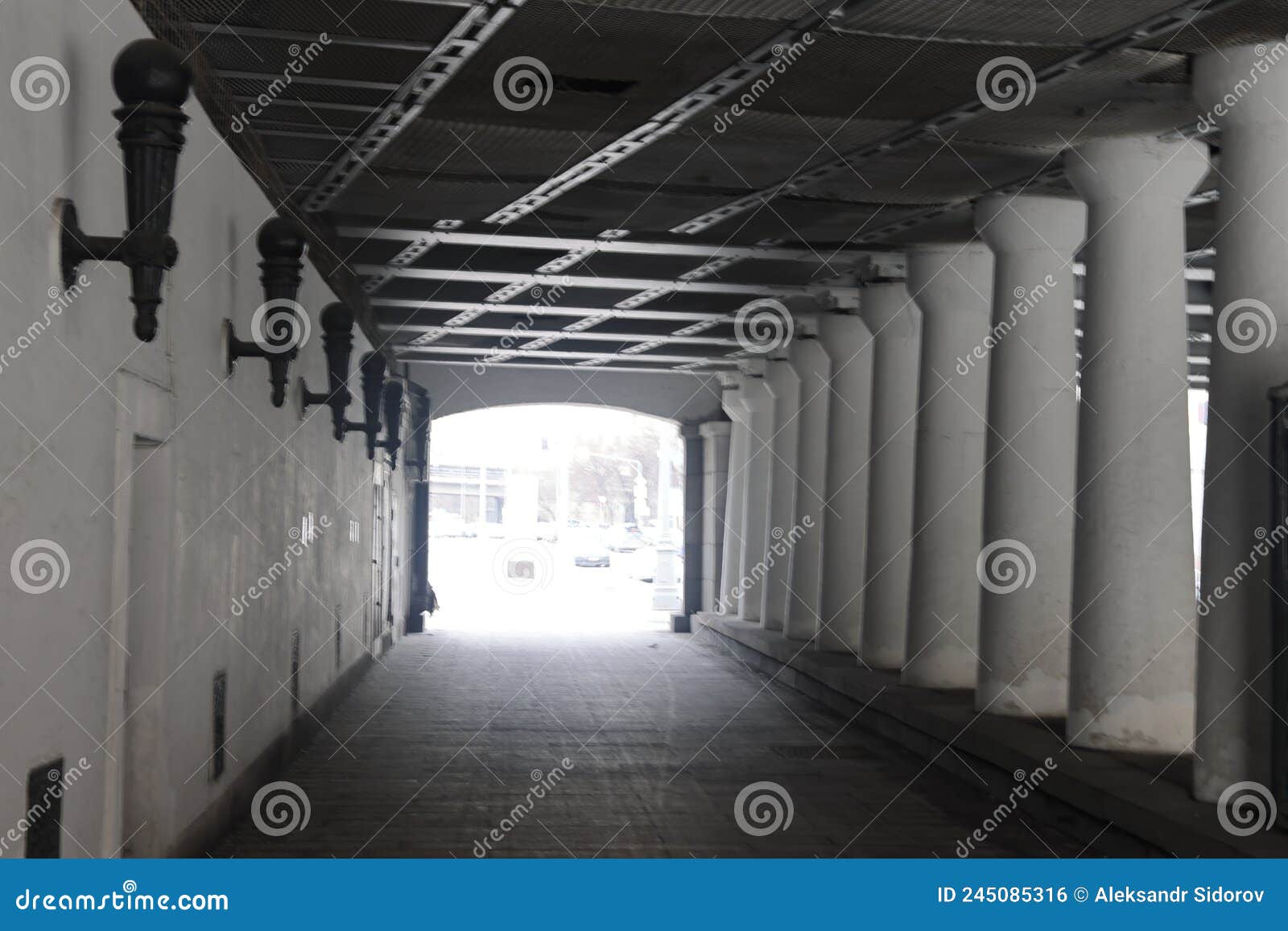 Crossing Under the Bridge, White Columns and Metal Structures, Light at ...