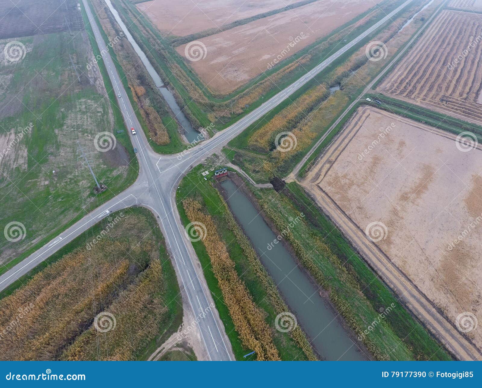 Crossroads Paved Roads through the Fields. View from Above Stock Photo ...