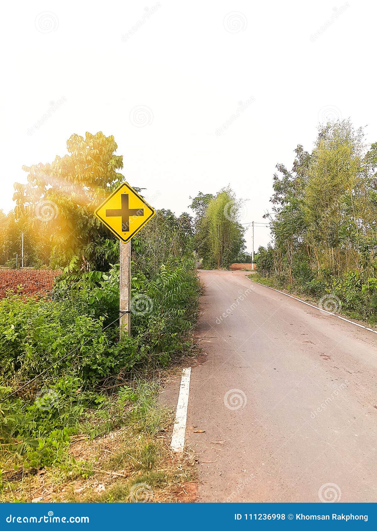 Crossroads Sign, Warns of an Intersection Ahead Stock Photo - Image of ...