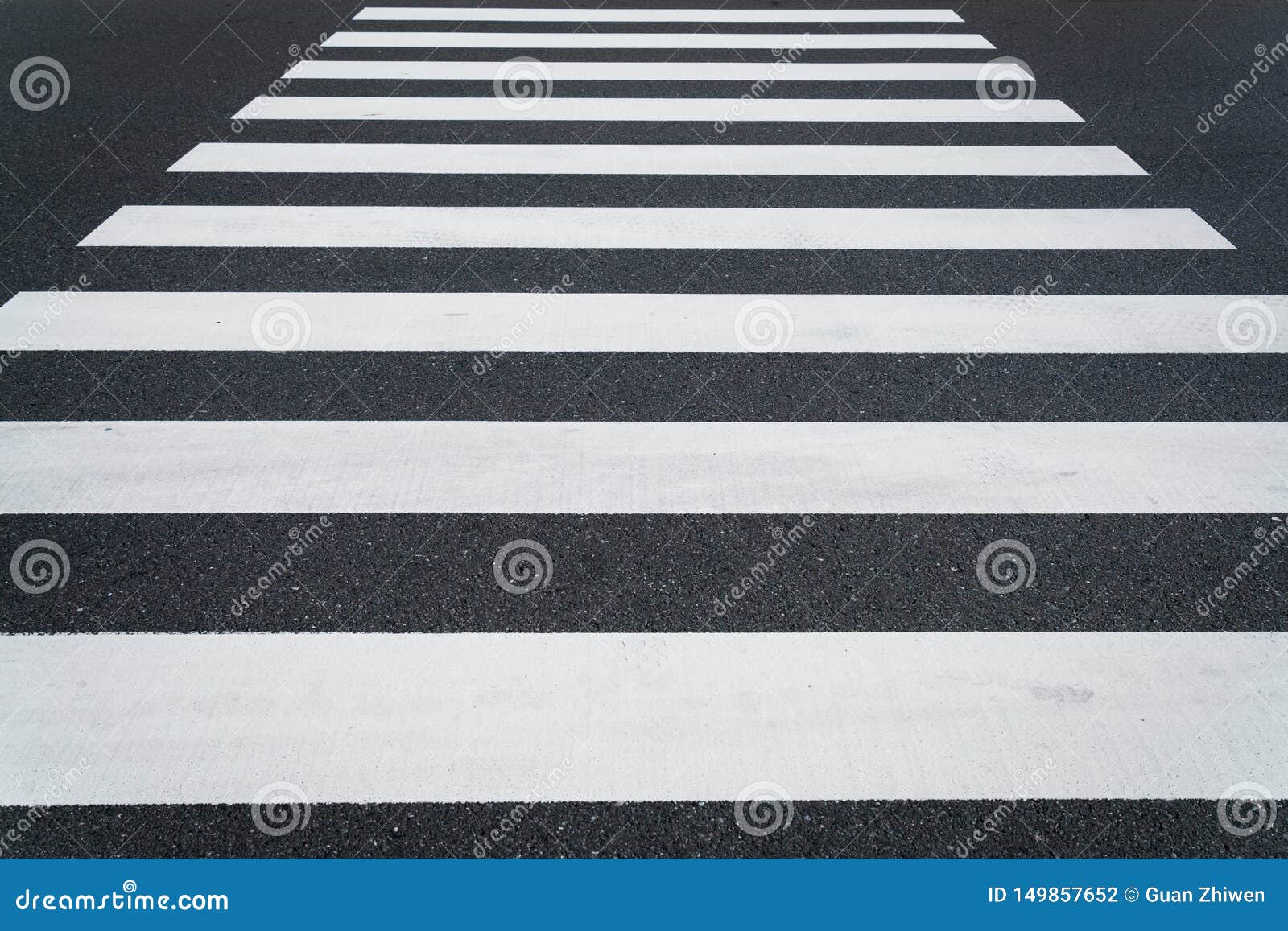 Crosswalk on the road stock photo. Image of people, pattern - 149857652