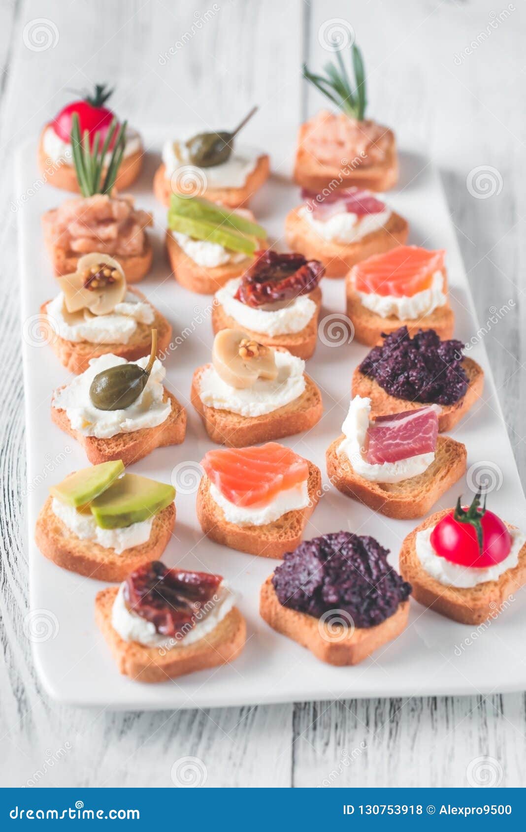 Crostini With Different Toppings Stock Photo | CartoonDealer.com #130753794