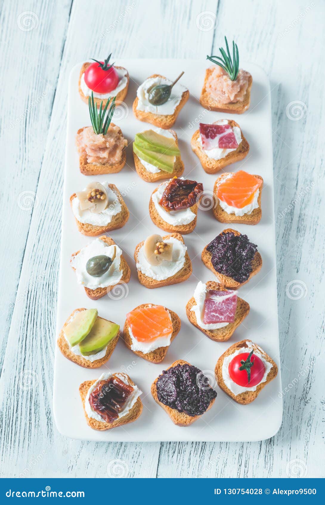 Crostini with Different Toppings Stock Photo - Image of canape, lunch ...