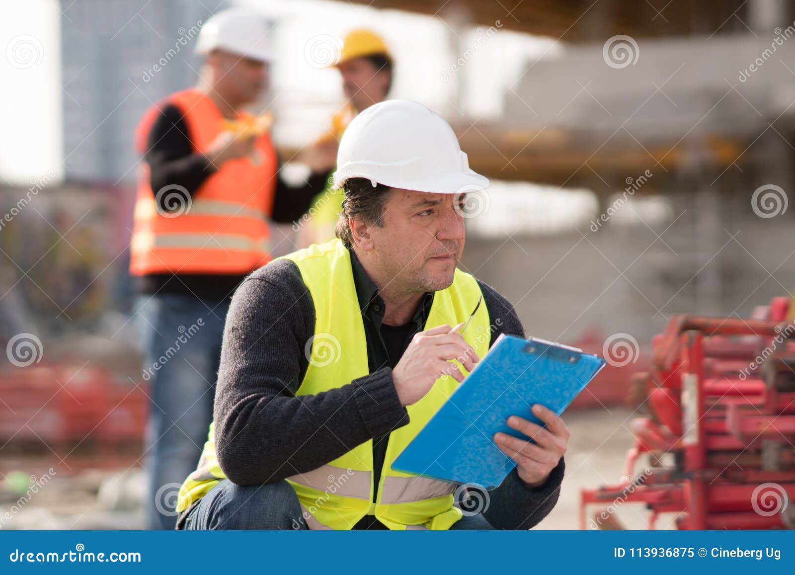 Foreman Working on Construction Site Stock Image - Image of examining ...