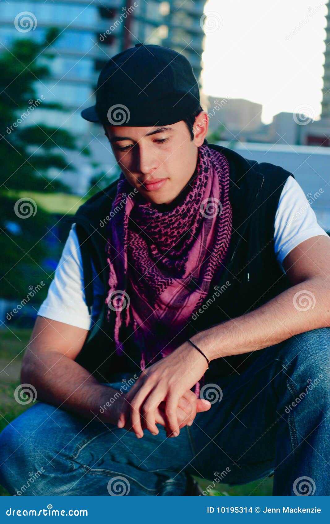 Crouching Looking Down stock photo. Image of young, urban - 10195314