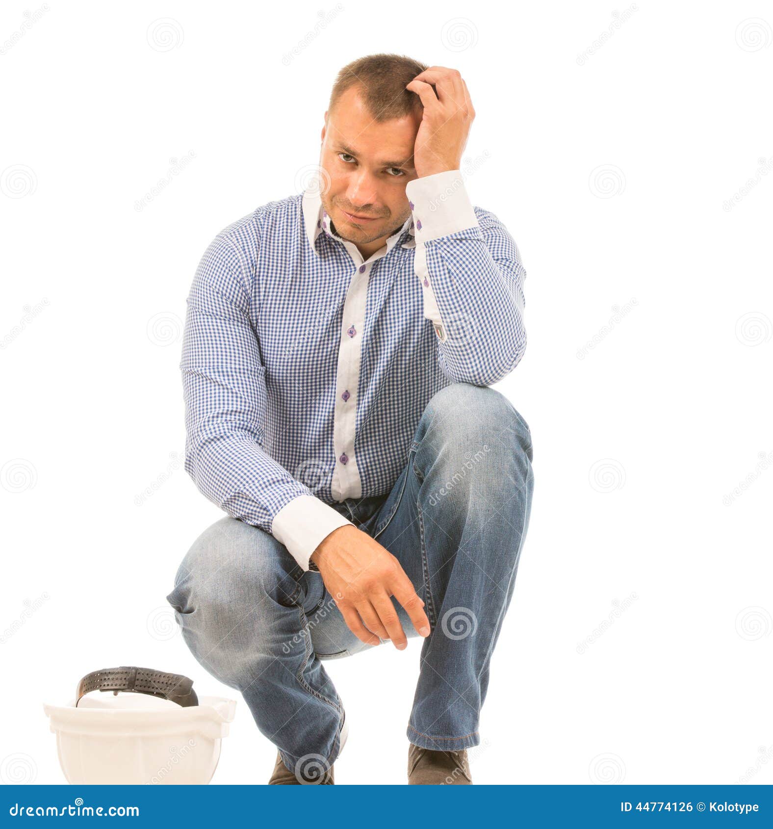 Crouching Man with Hard Hat Scratching Head Stock Photo - Image of ...