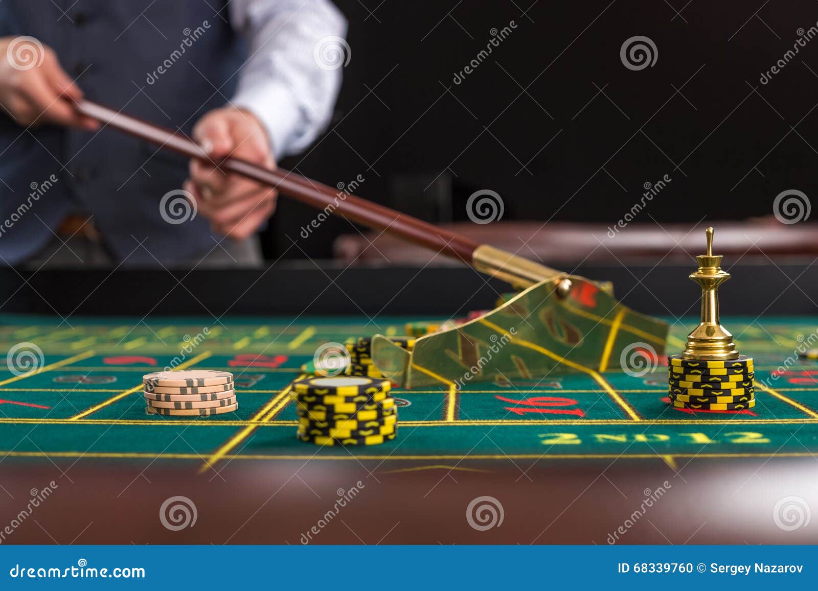 Croupier Collects Chips Using Stick in Casino. Stock Photo - Image of ...