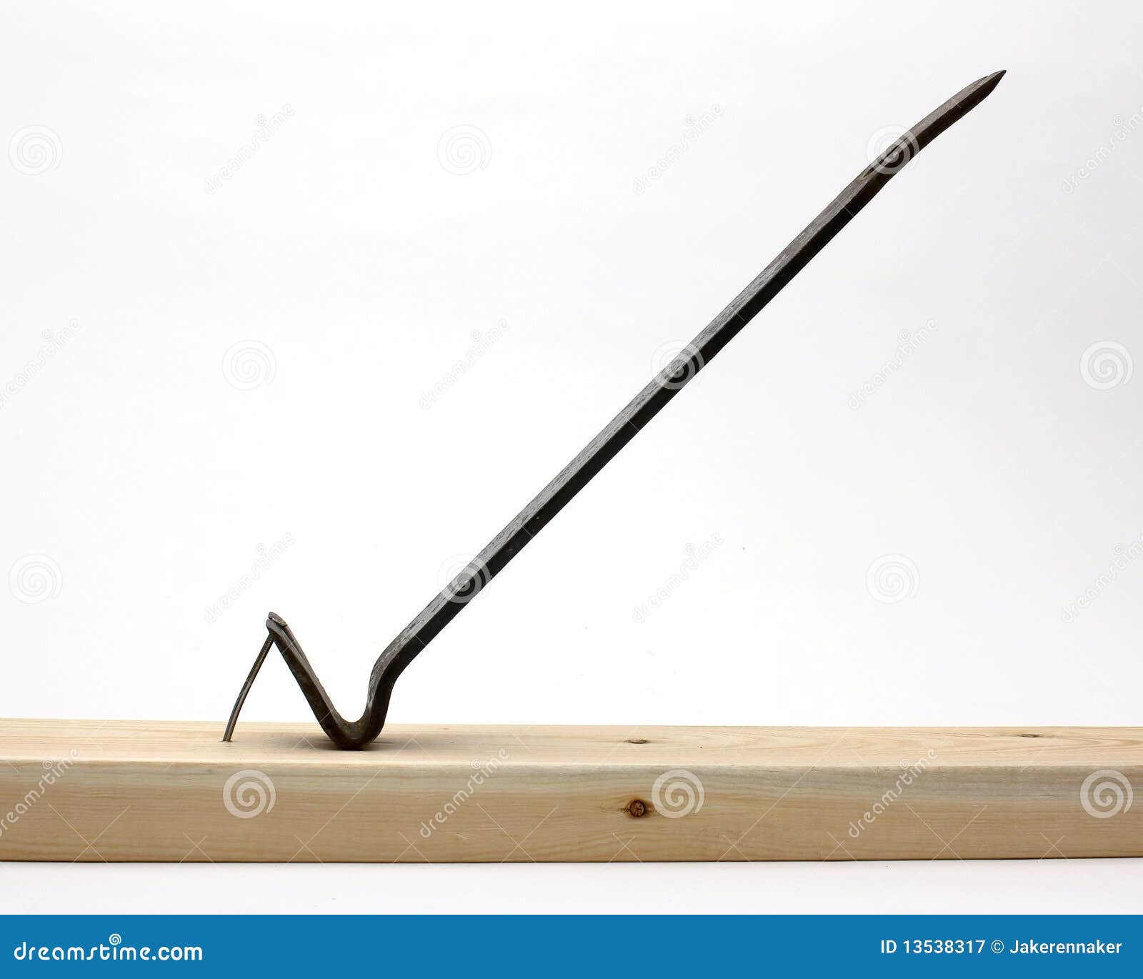 Crow bar pulling a nail stock image. Image of white, tool - 13538317