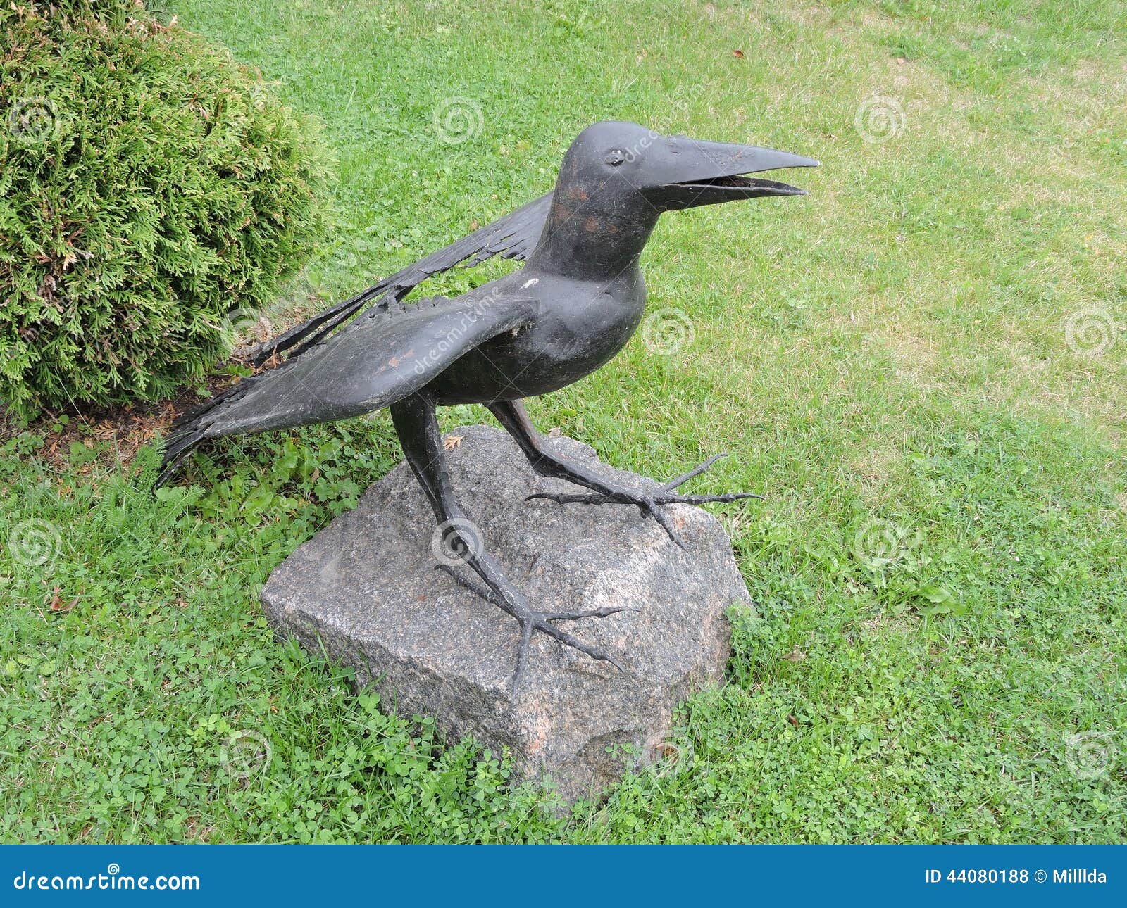 Crow bird sculpture stock photo. Image of grass, stone - 44080188