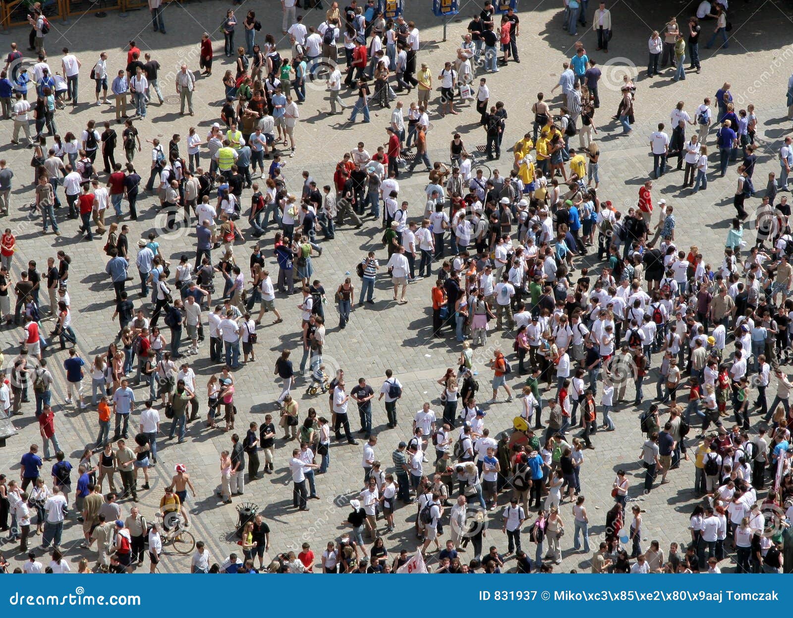 Please, what is the correct way to describe this picture: town crowd OR ...