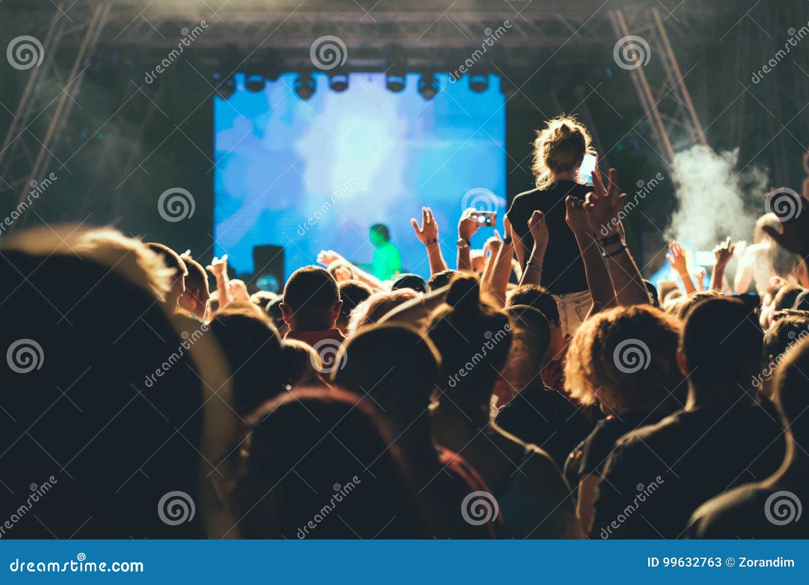 Crowd in a concert editorial stock photo. Image of open - 99632763