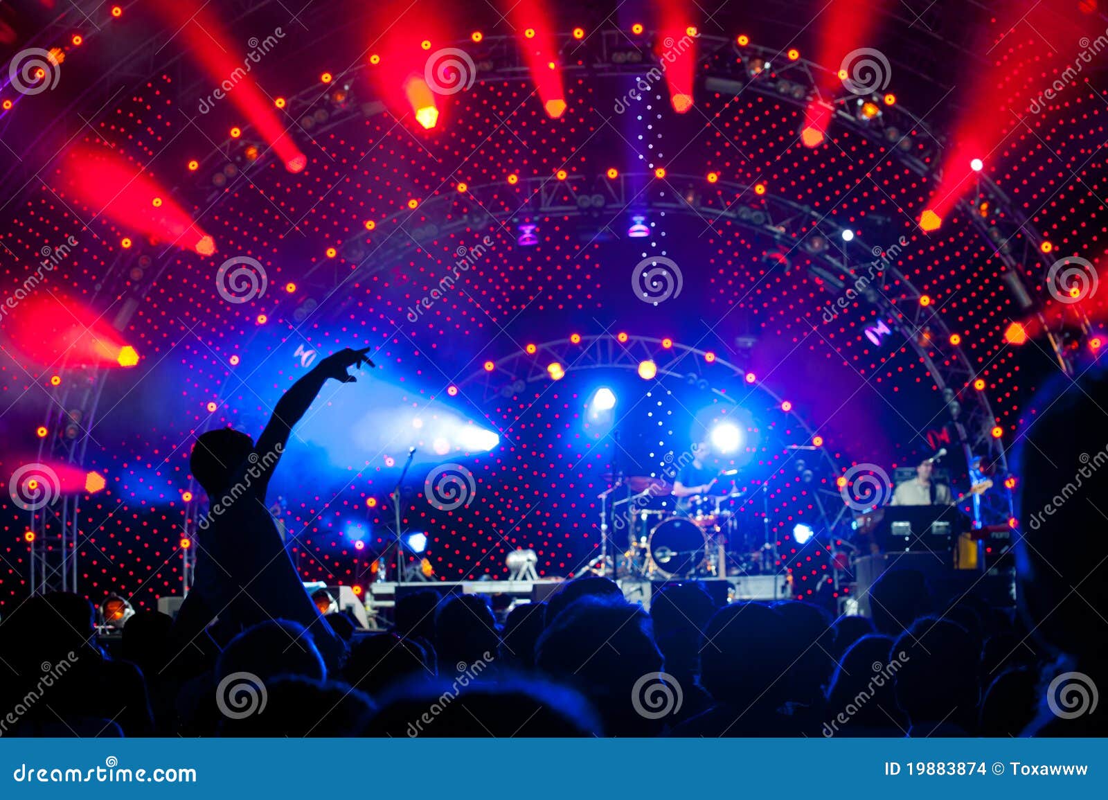 Crowd of fans at a concert stock photo. Image of back - 19883874