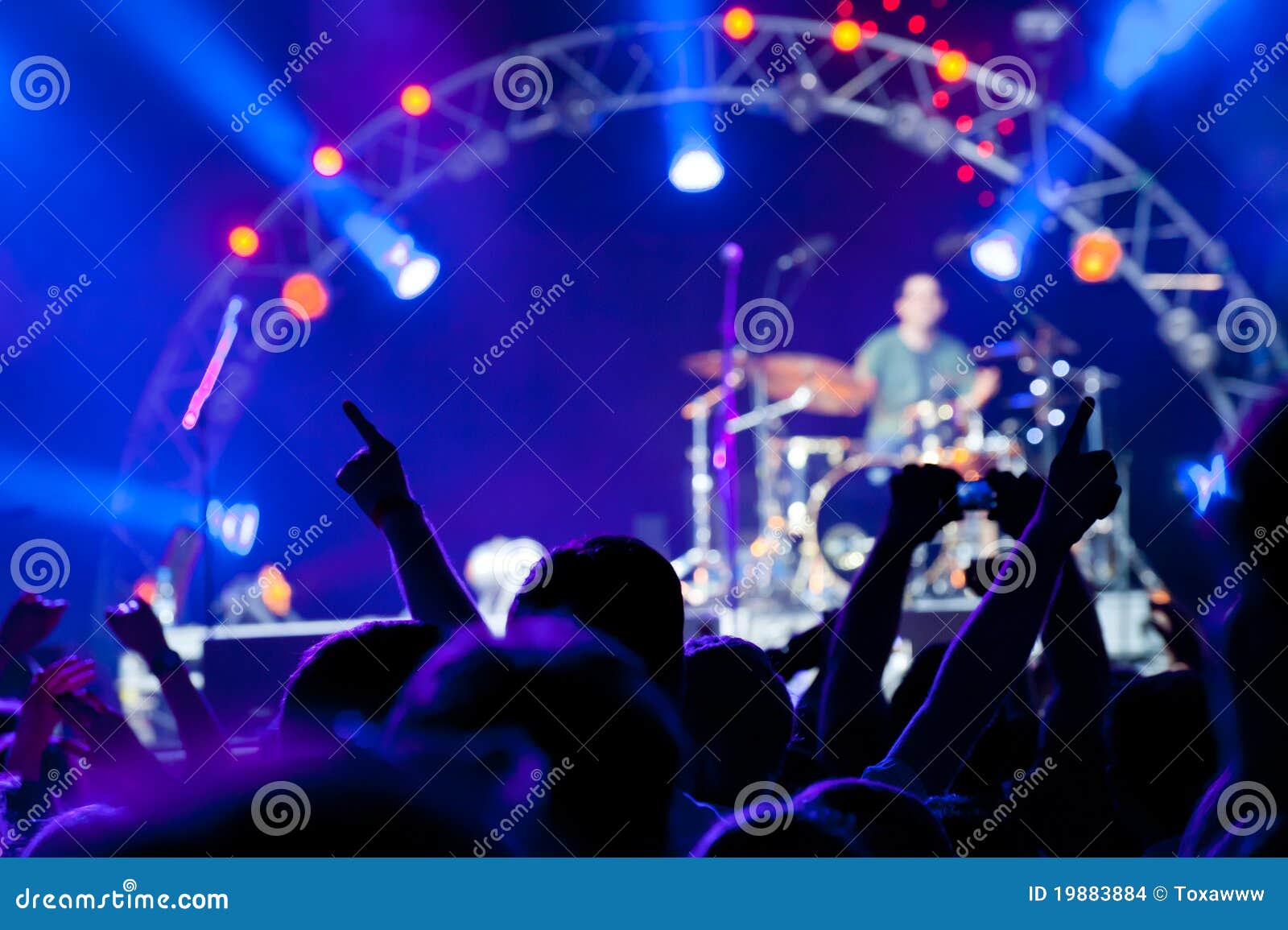 Crowd of fans at a concert stock photo. Image of dance - 19883884