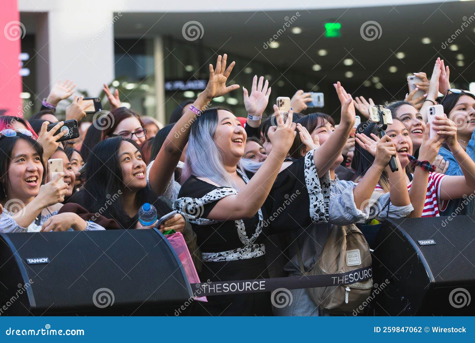 Crowd of Fans of KPop Participating in a Group Dance Activity Called ...