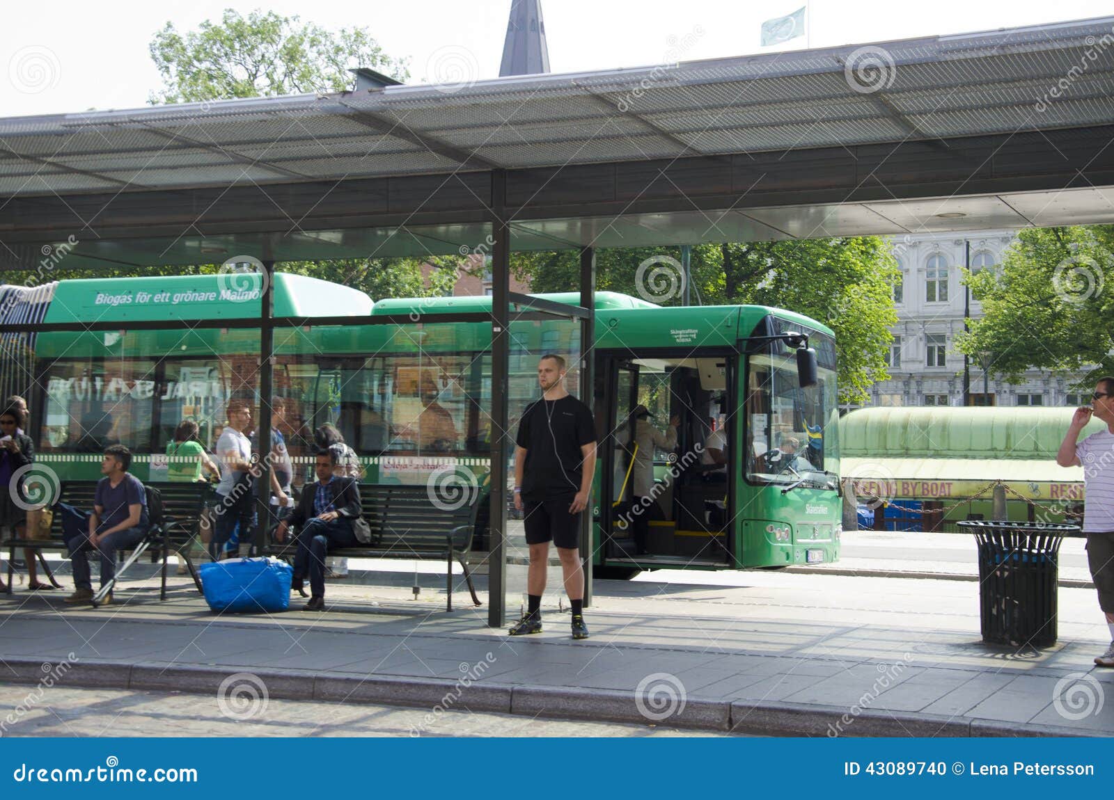 Crowd Of People At A Bus Stop Editorial Image - Image: 43089740