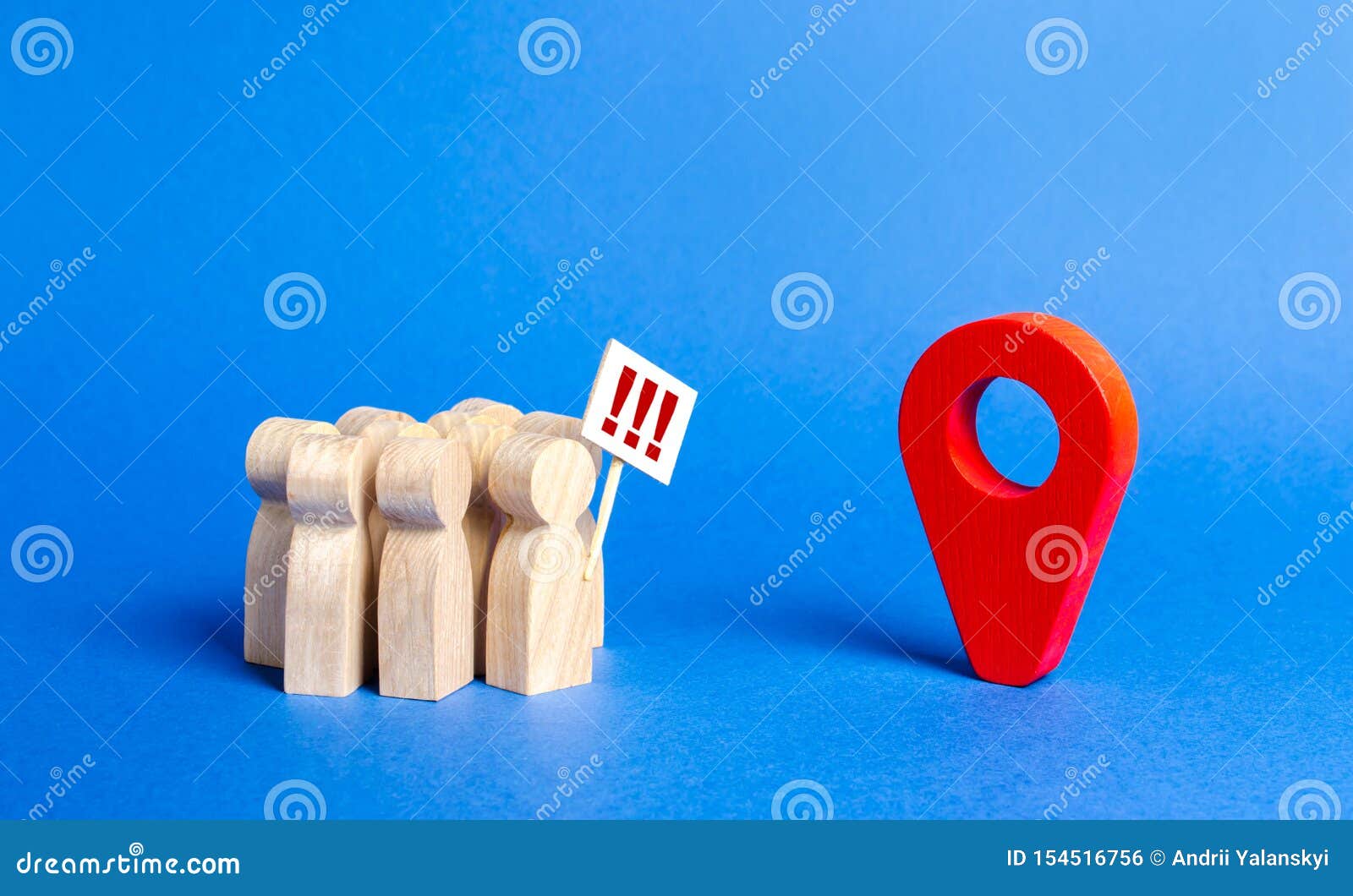 A Crowd of People with Posters Stands in Front of a Red Navigation ...