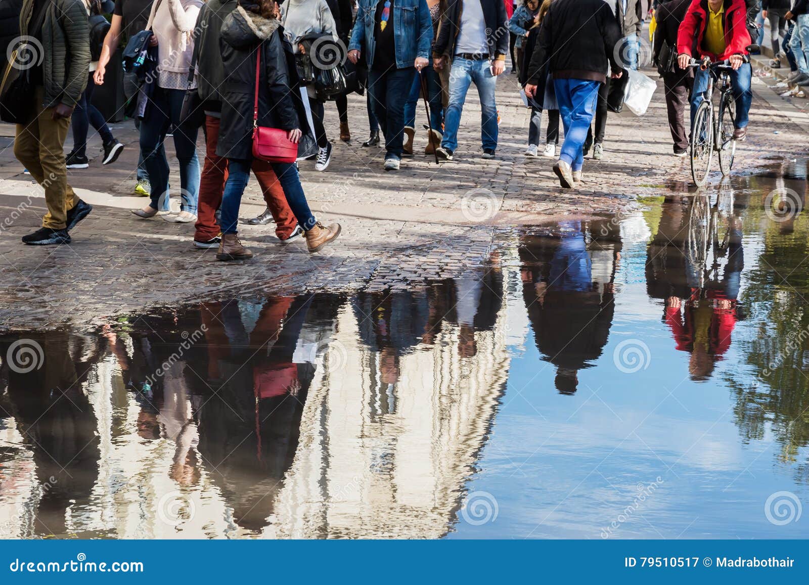 Crowd of People Reflecting in a Puddle Stock Image - Image of riding ...