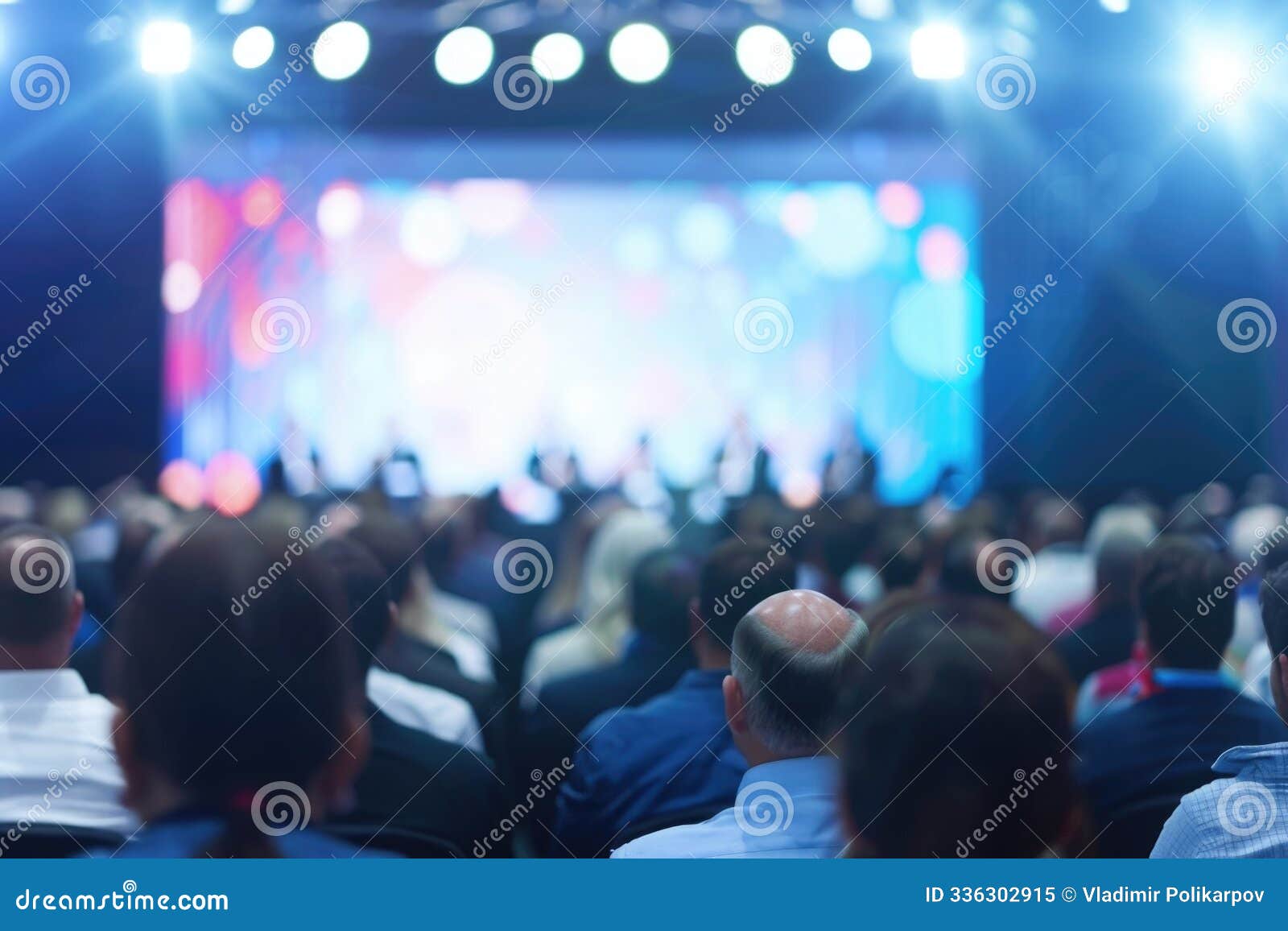 A Crowd of People Seated and Waiting for a Performance To Begin Stock ...
