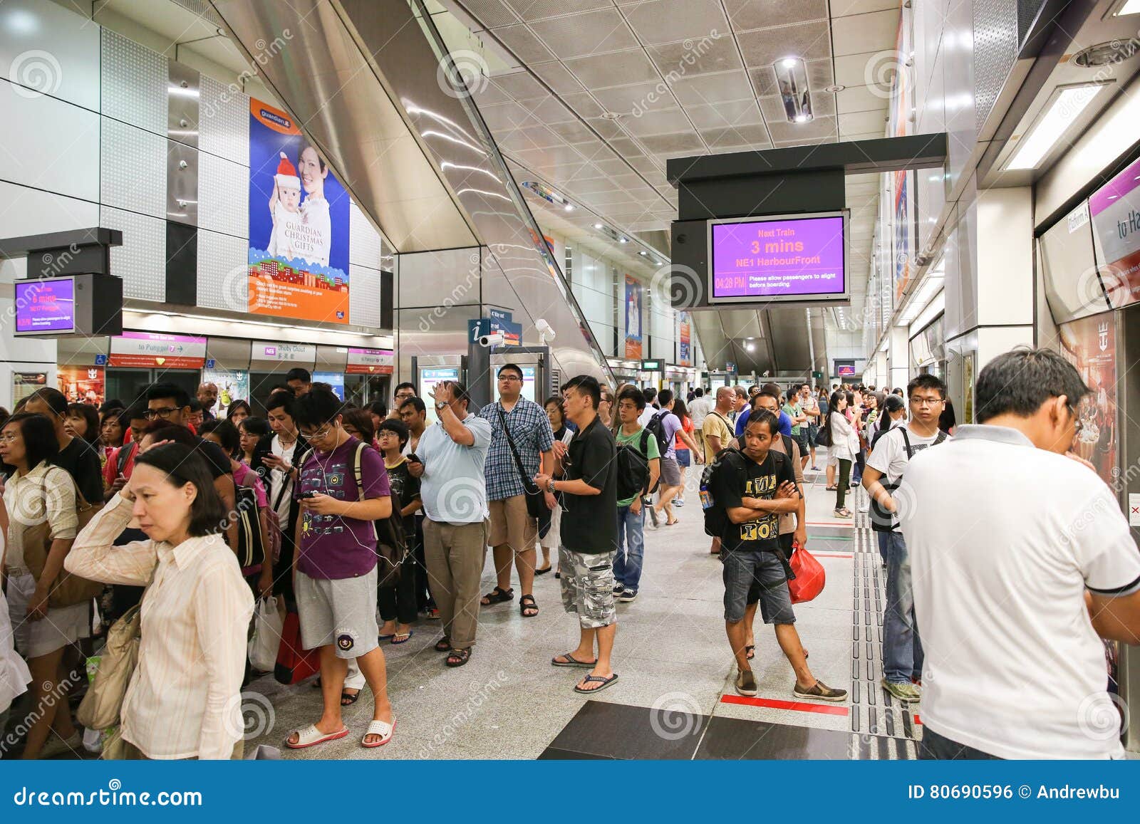 Crowd of People in Singapore Subway Waiting for the Train. Editorial ...