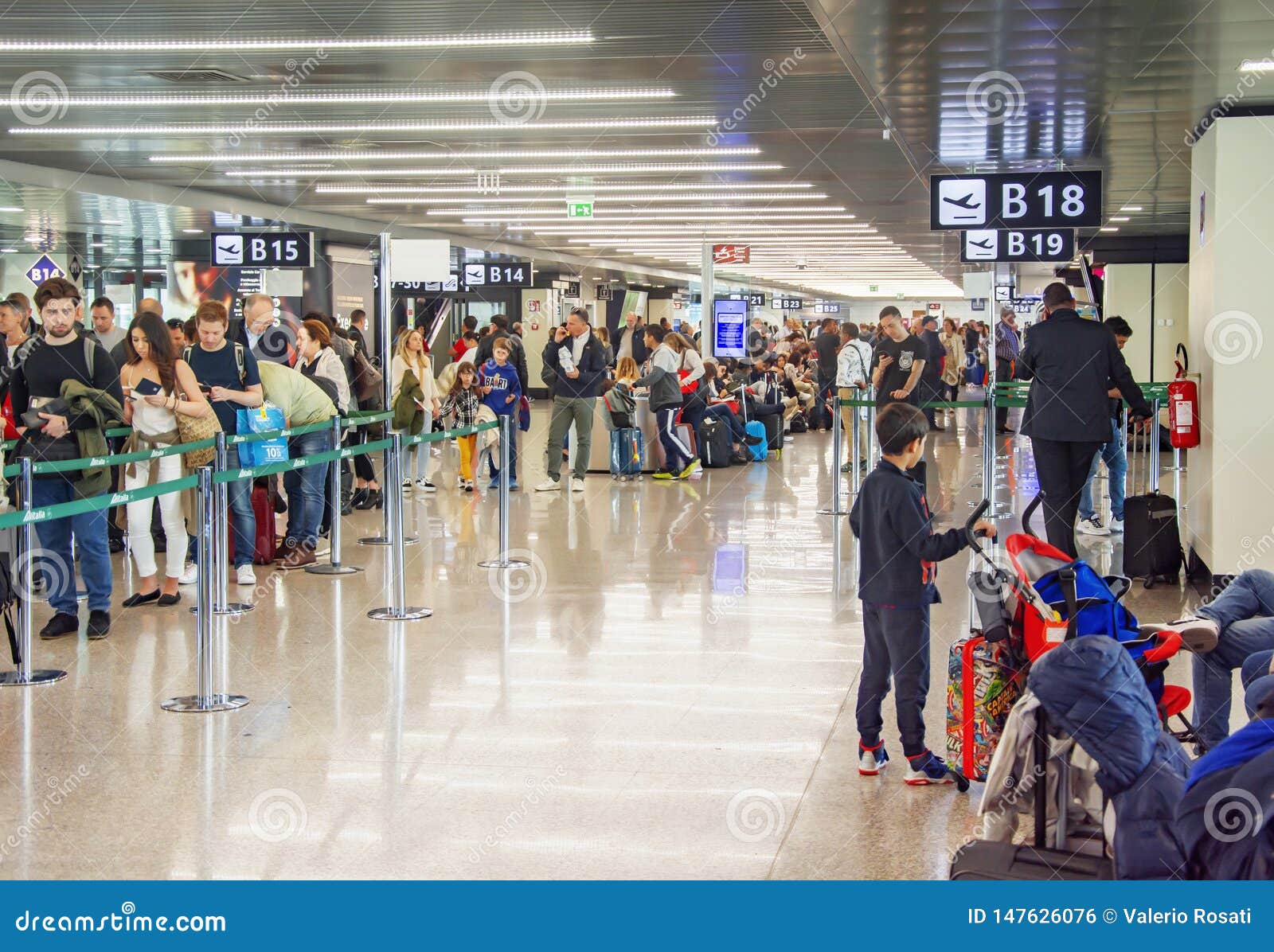 Crowd of People Waiting in Line To Check in at an Airport Editorial ... Crowd of People Waiting in Line To Check in at an Airport Editorial ...