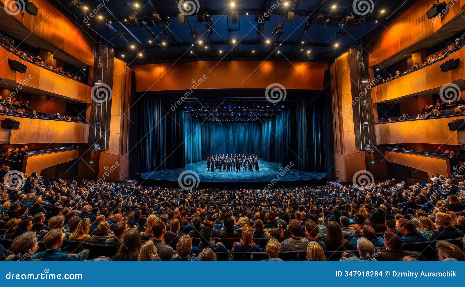 The Crowd at a Performance in a Modern Theater, Highlighted by Stage ...