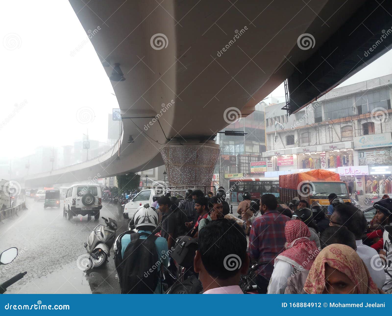 Crowd, Rain, Under the Bridge Editorial Photography - Image of crowd ...