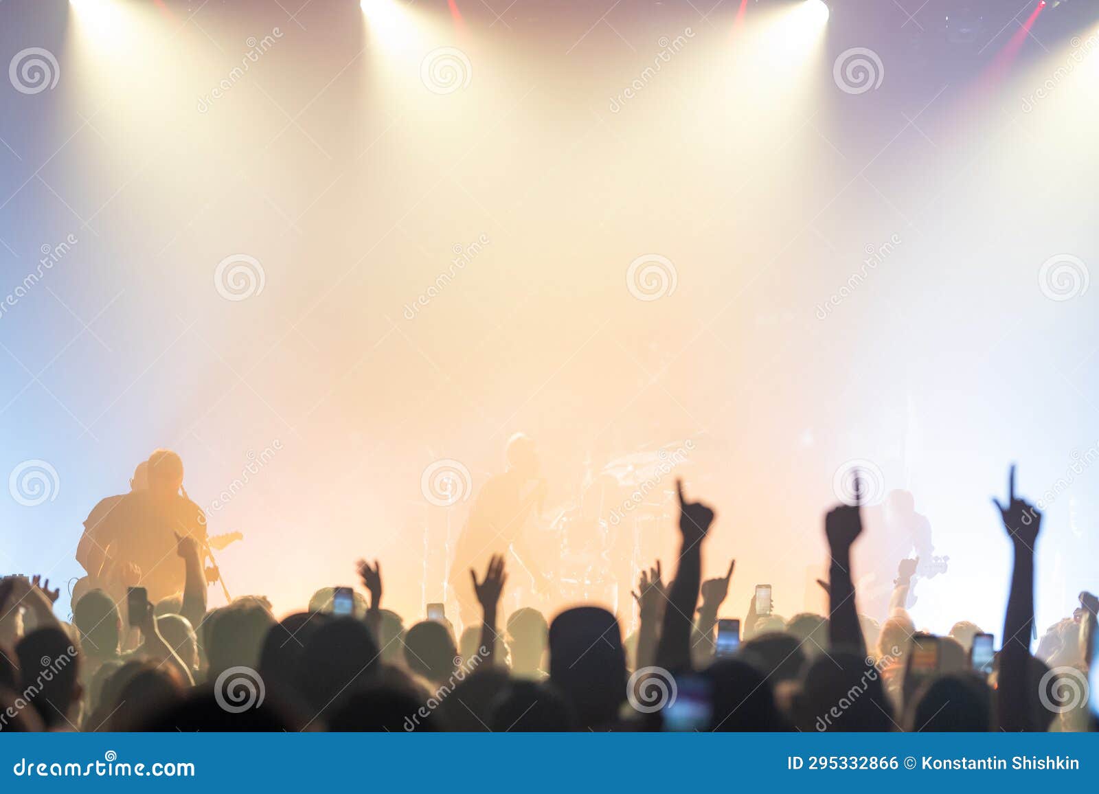 Crowd Raising Hands Under Bright Light - Rock Concert Editorial Photo ...