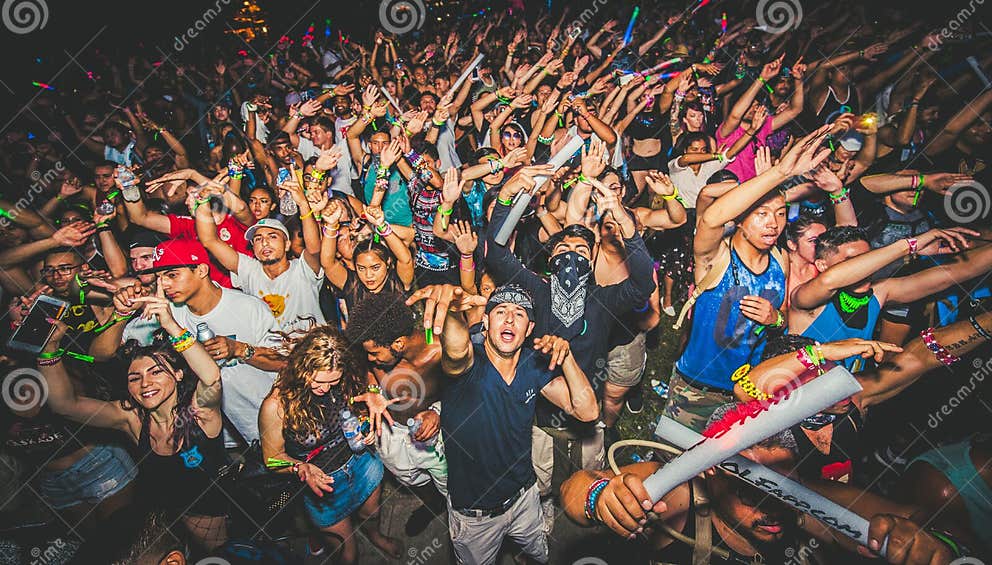 Crowd at a Rave editorial stock image. Image of hands - 138584569