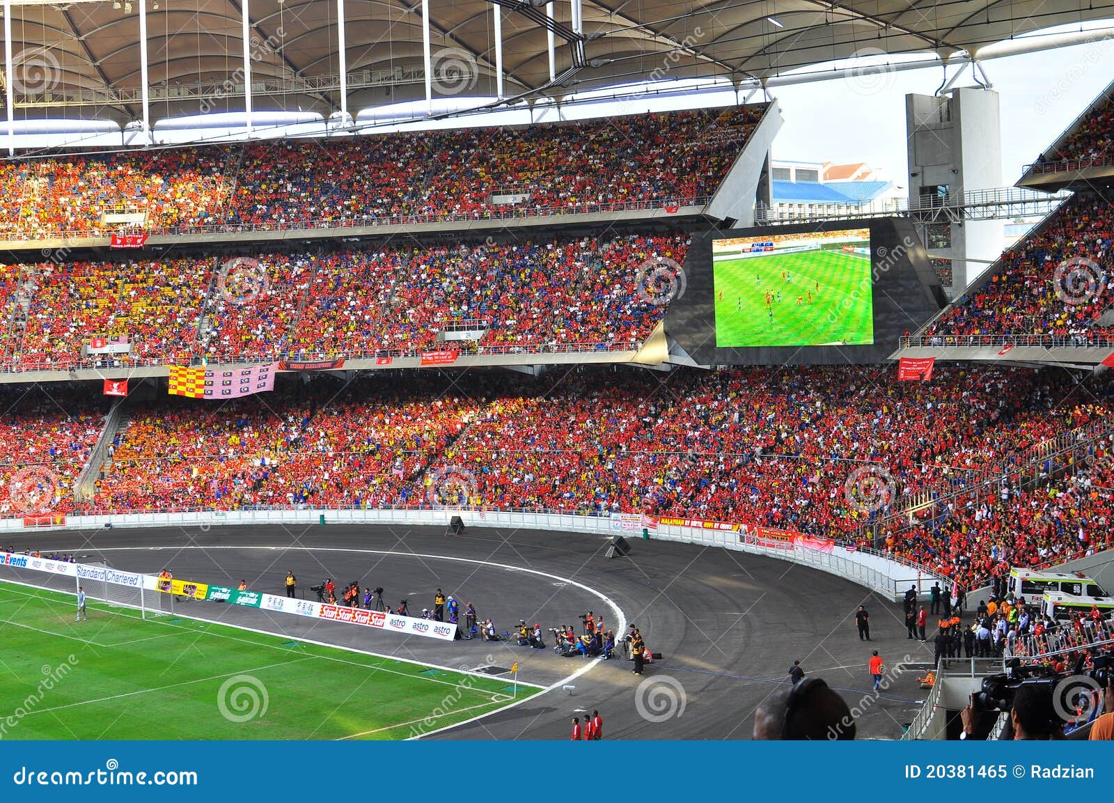 Crowd At Stadium With Big Screen In The Background Editorial Photo ...