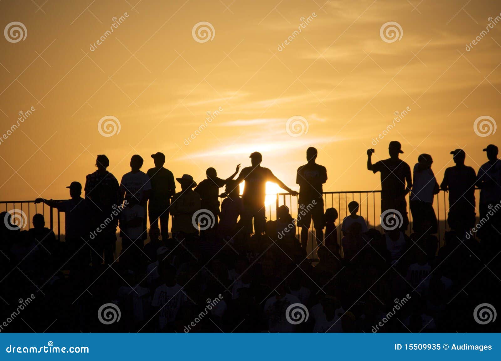 Crowd at Sunset stock image. Image of silhouette, crowds - 15509935