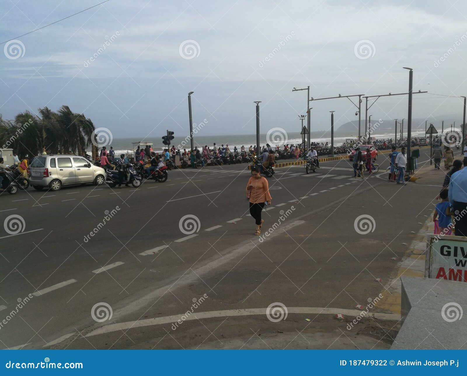 Crowd and Traffic in the Beach Road. Editorial Photography - Image of ...