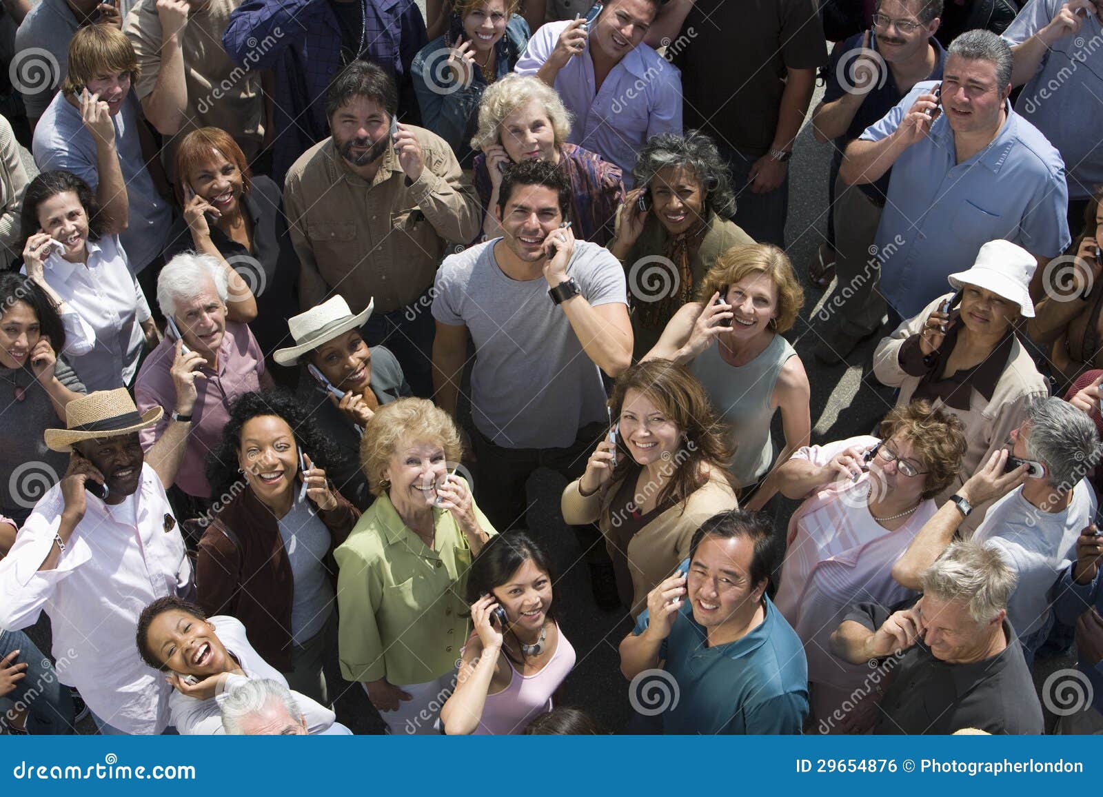 Crowd Using Cell Phones stock photo. Image of communication - 29654876