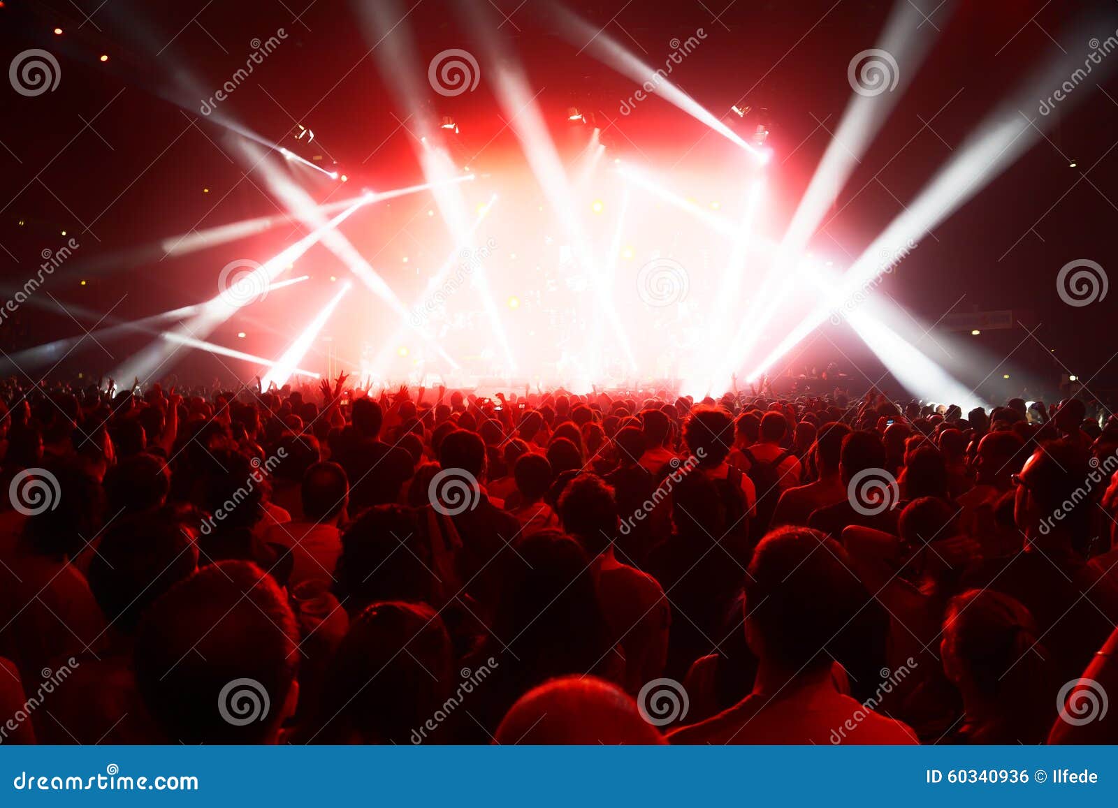 Crowd of Young People in Front of Bright Stage Lights Editorial Photo ...