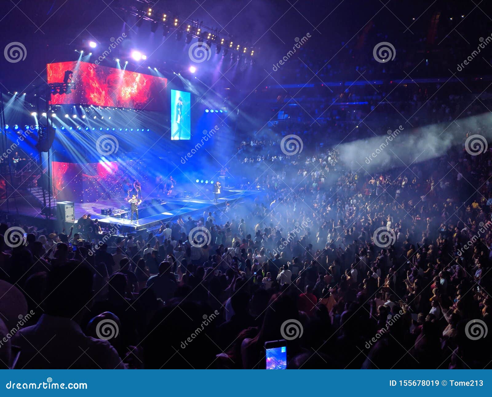 A Crowded Arena and Concert Scene Editorial Stock Image - Image of ...