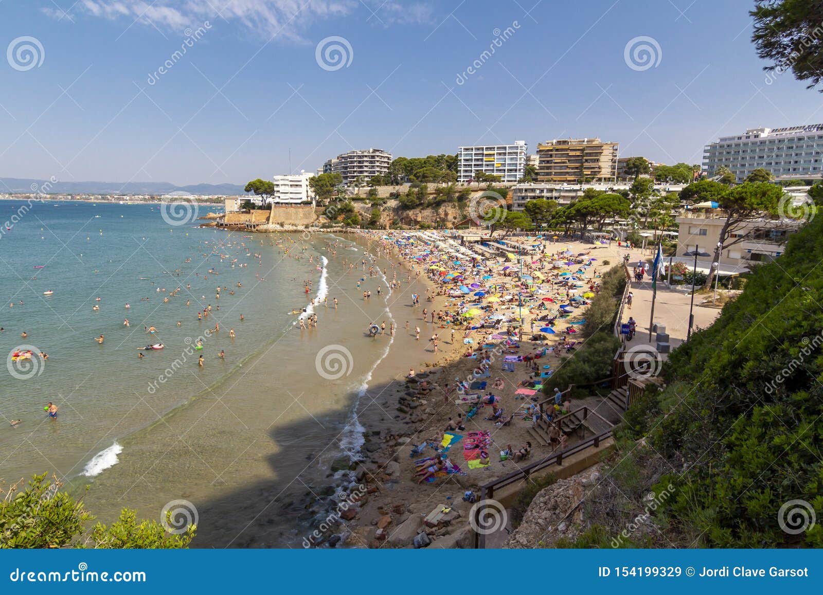 Crowded beach in Salou stock image. Image of ocean, summer - 154199329