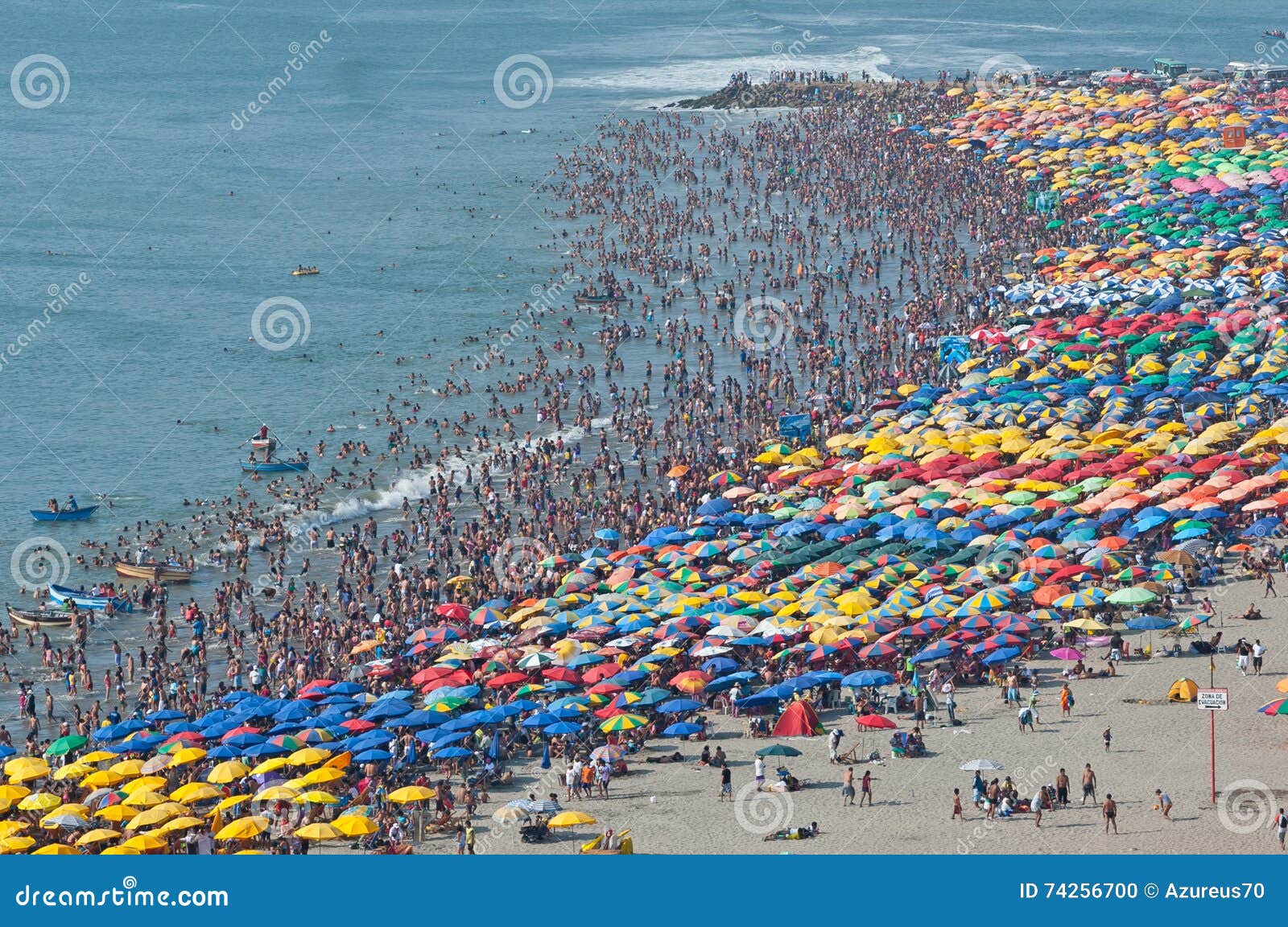 Crowded beach stock photo. Image of coast, relax, people - 74256700