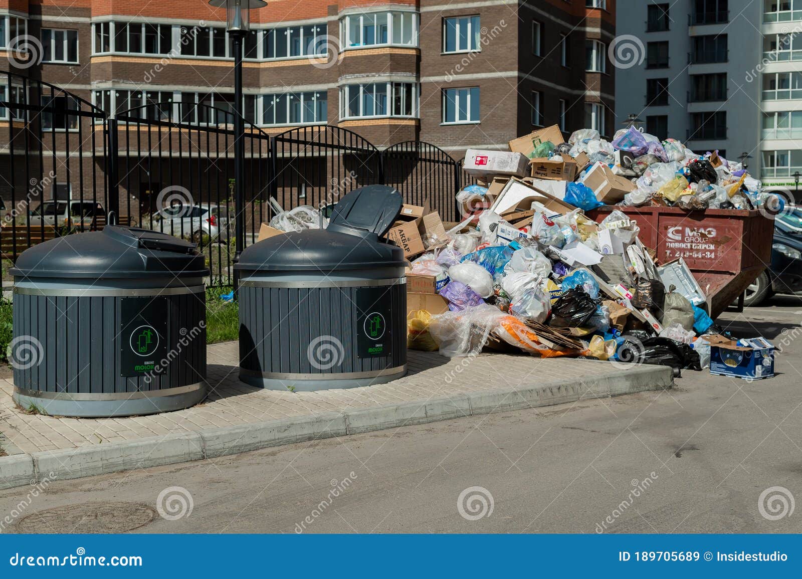 Crowded Garbage Cans in the Courtyard of a Residential Apartment ...