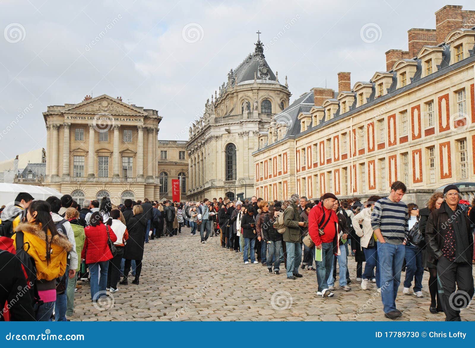 Crowds Queuing To Cross The Famous Stepping Stones At River Dove ...