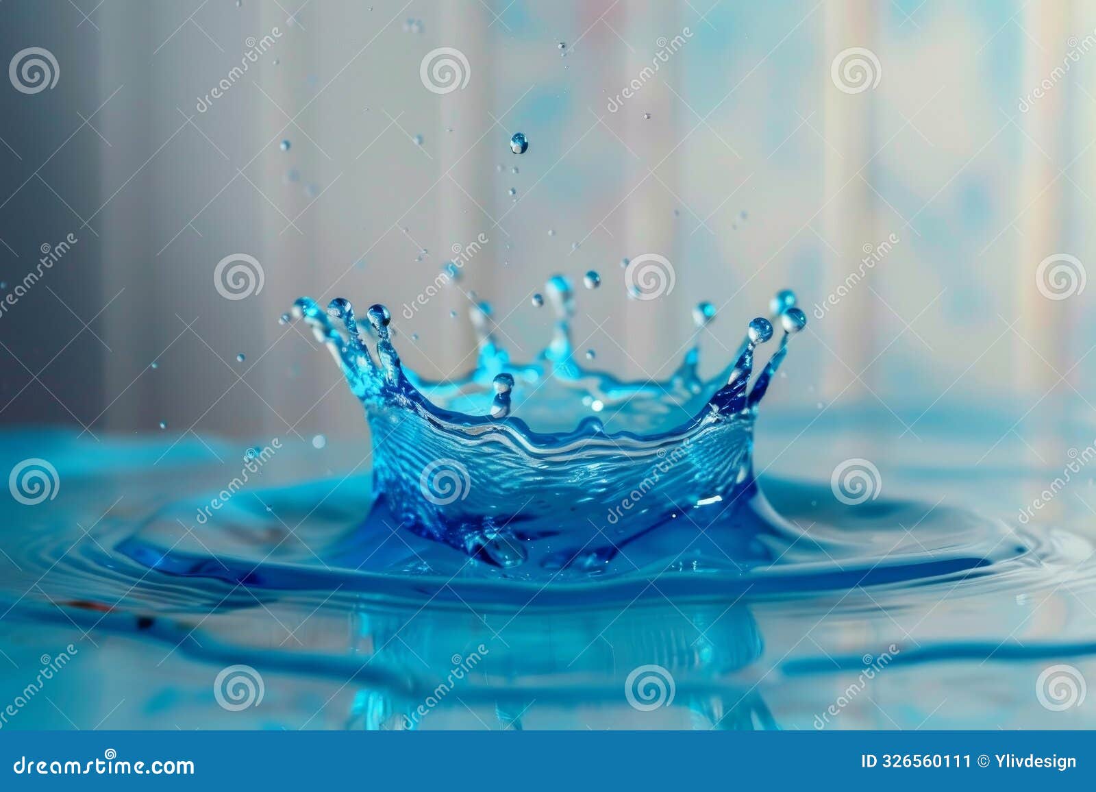 Crown Shaped Water Splash Forming on Blue Liquid Surface Stock ...