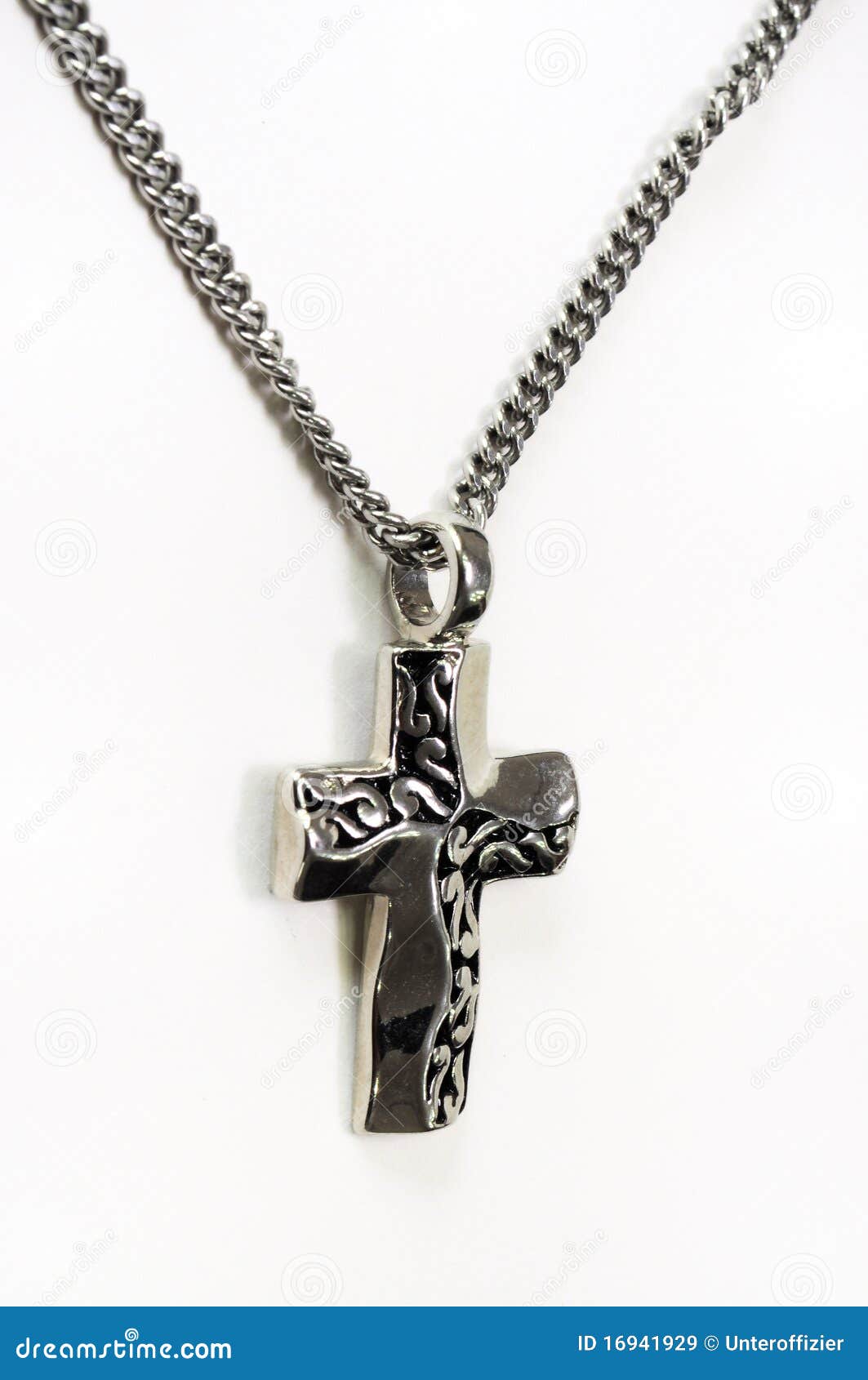 Crucifix & Chain With Jesus Christ On Stained Glass Next To Bible ...