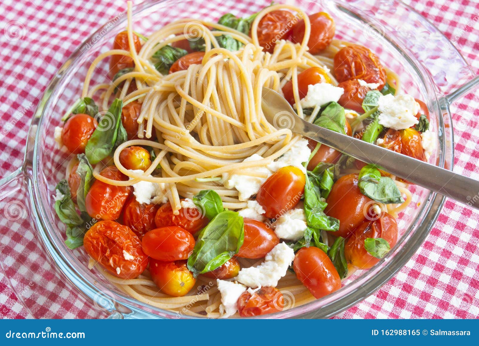 Crudaiola Pasta with Cherry Tomatoes Basil and Mozzarella Stock Image ...
