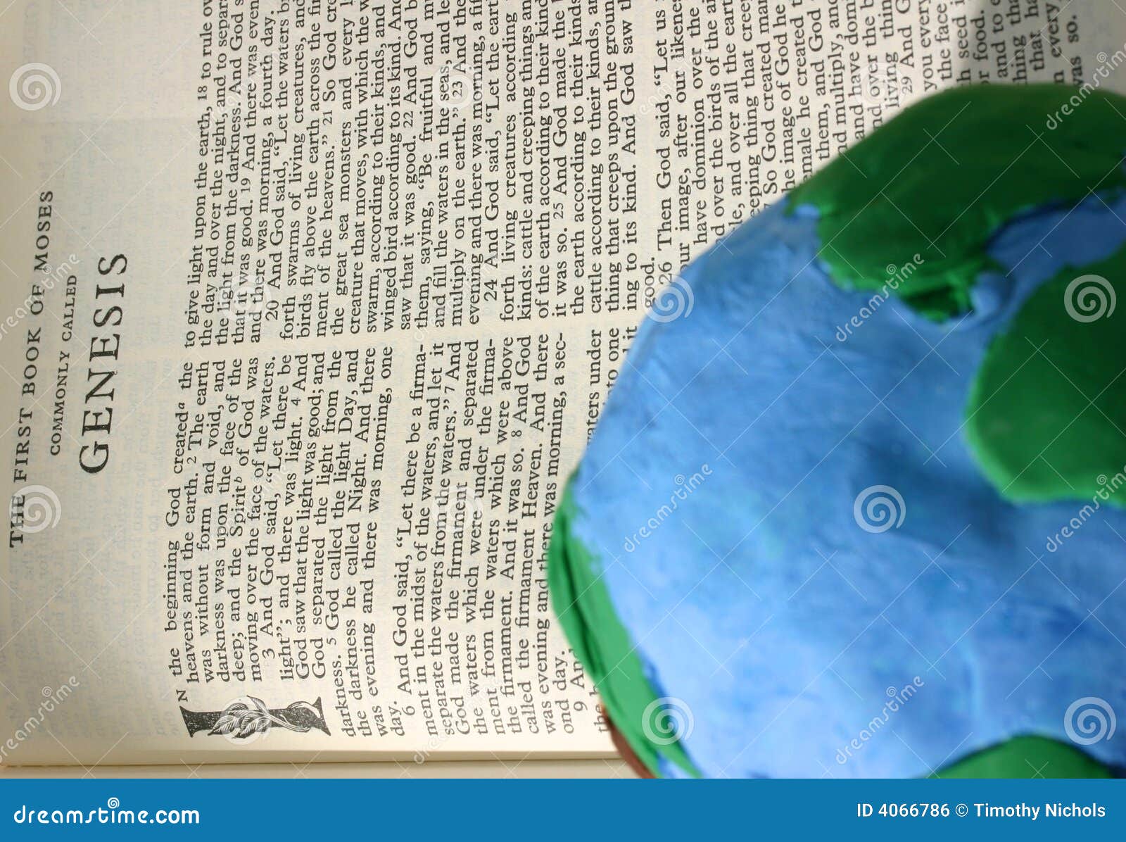 Crude Earth Globe On Bible Picture. Image: 4066786