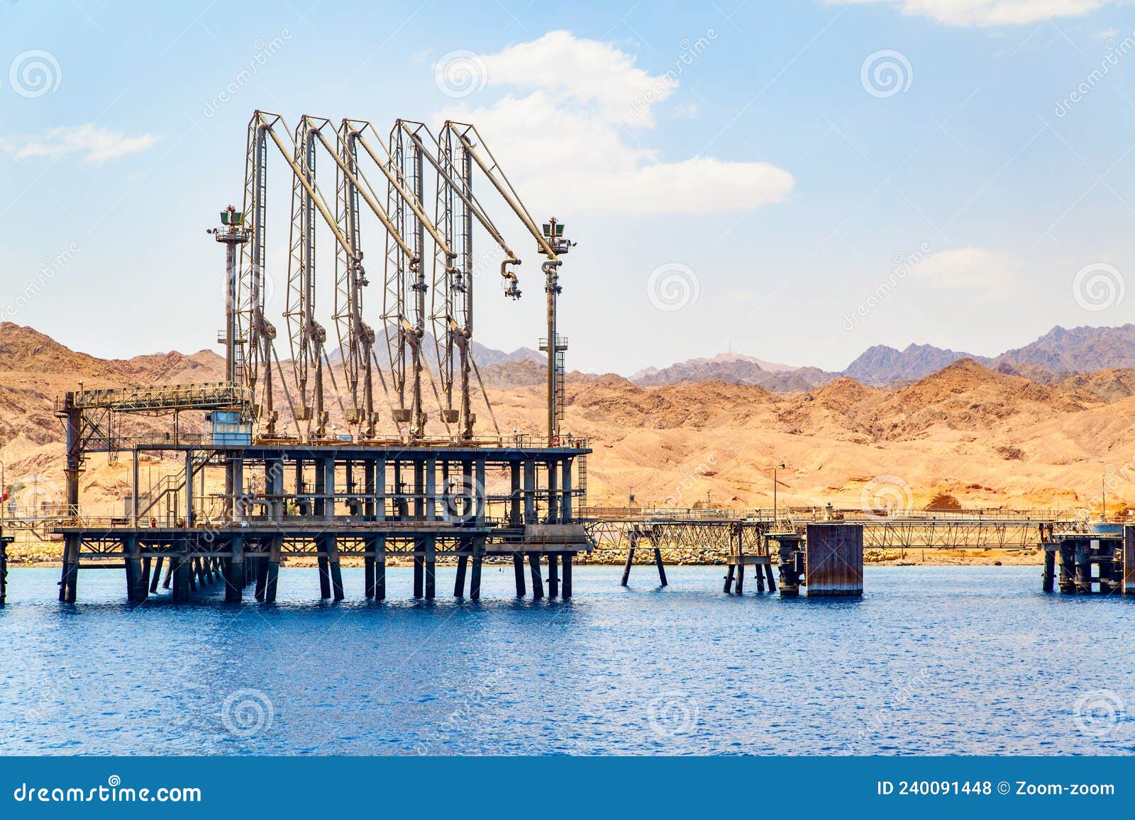Crude oil loading terminal stock photo. Image of hose - 240091448