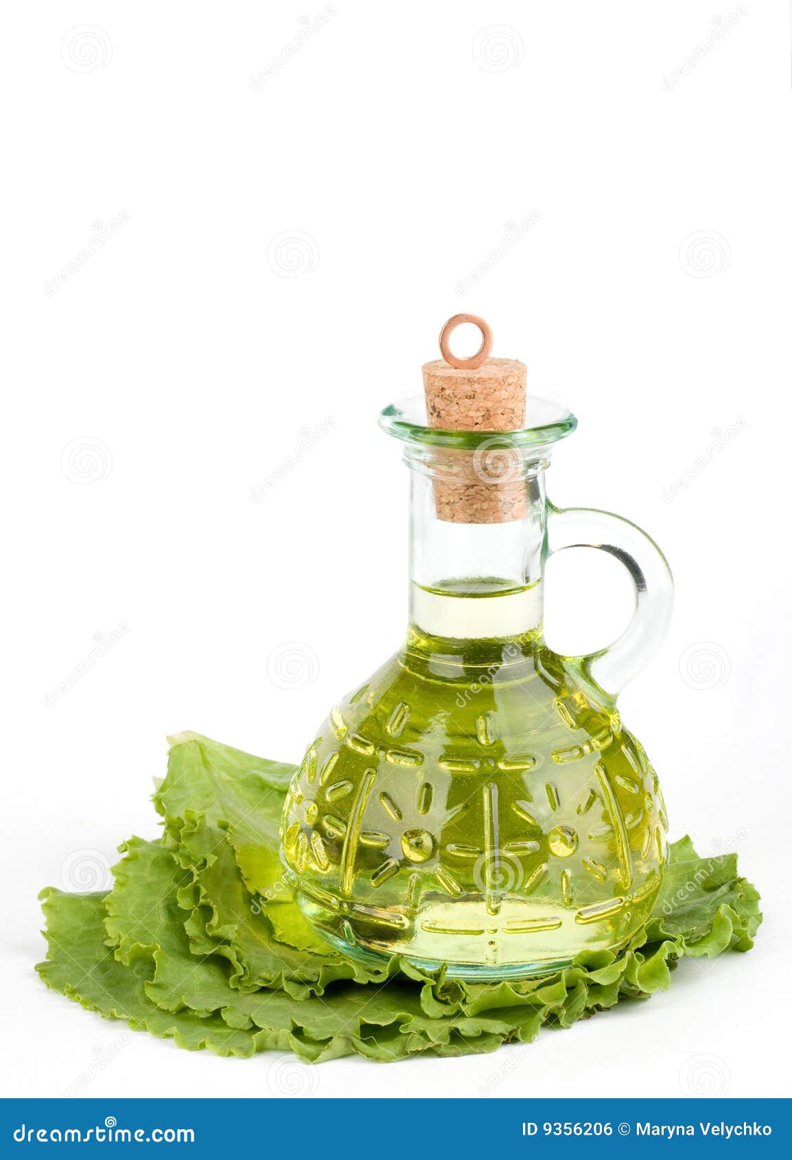 Cruet with oil on lettuce stock photo. Image of lettuce - 9356206