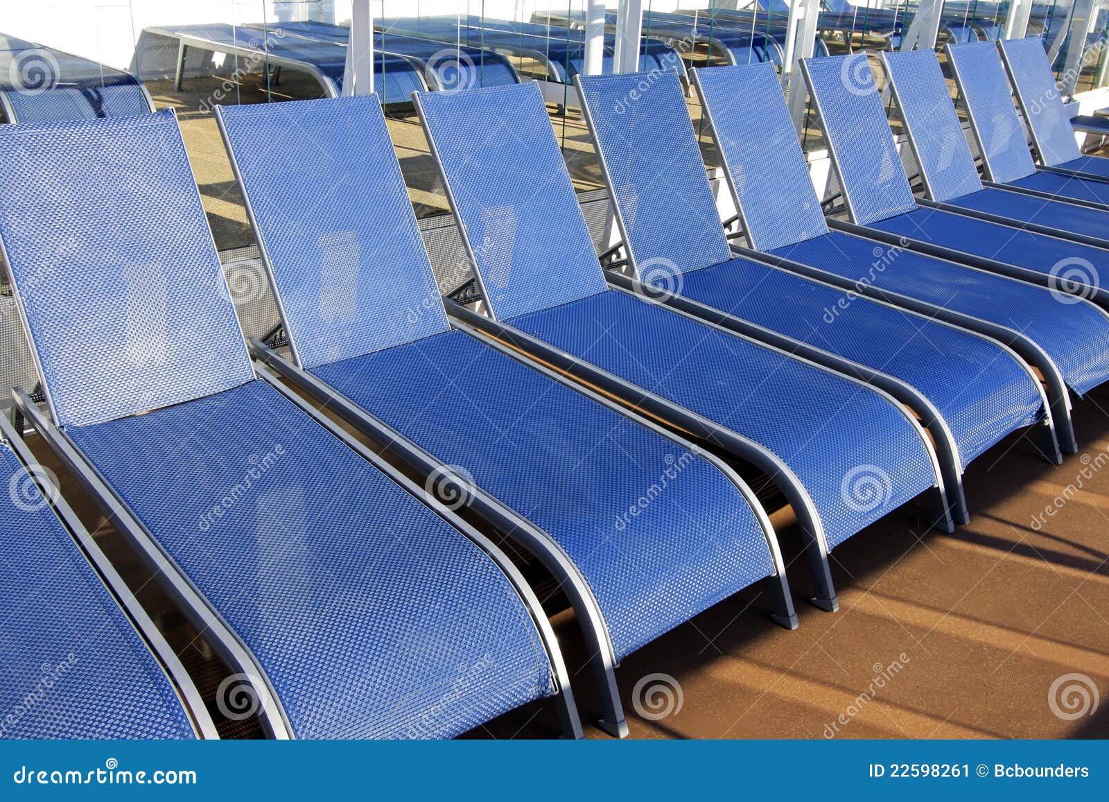 Cruise Ship Deck Chair Line-Up Stock Image - Image of recline, fabric ...