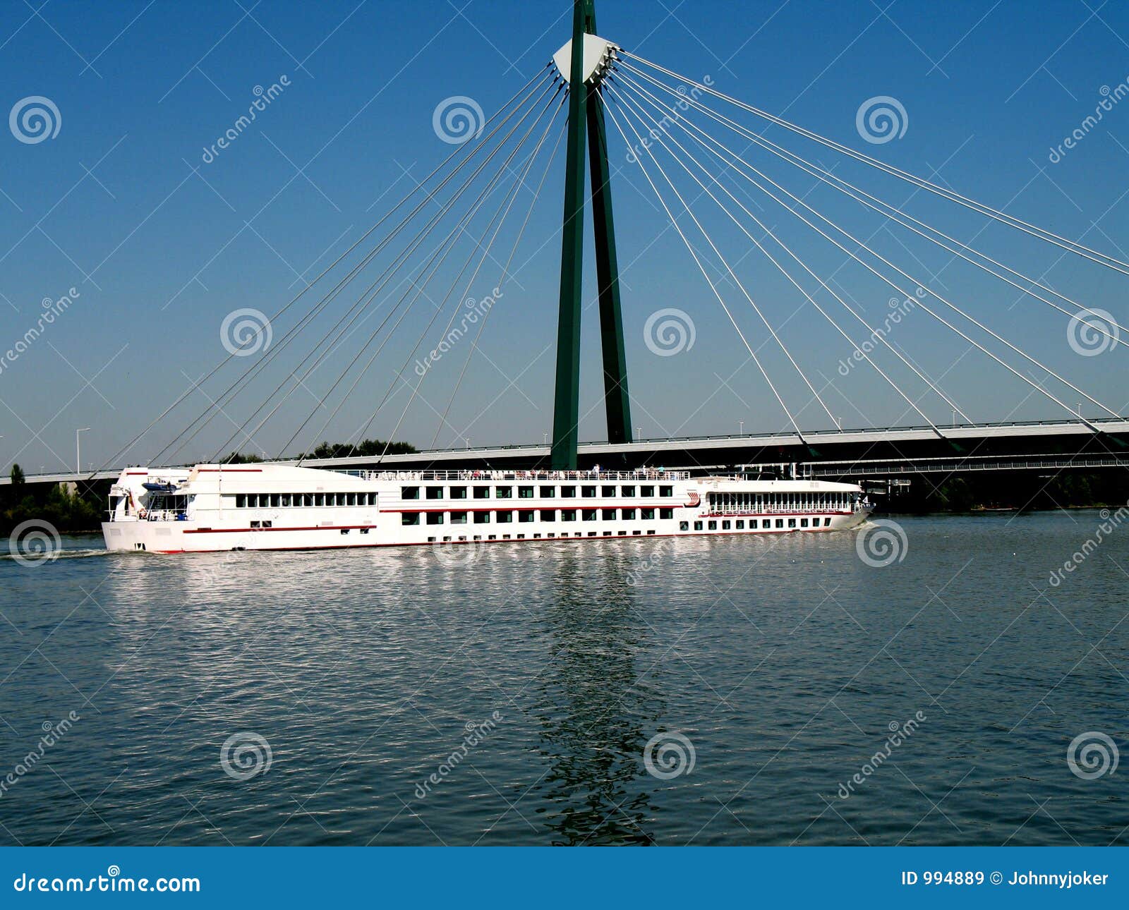 Cruiser under bridge stock image. Image of austria, boating - 994889
