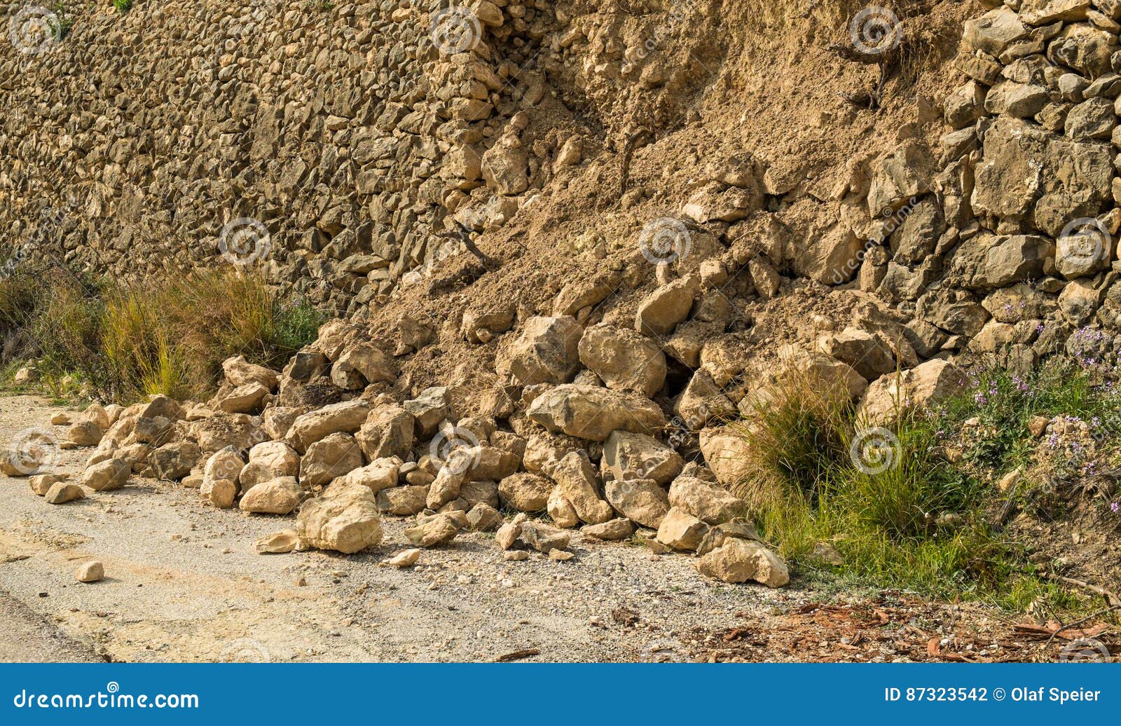 Crumbled contention wall stock photo. Image of terrain - 87323542