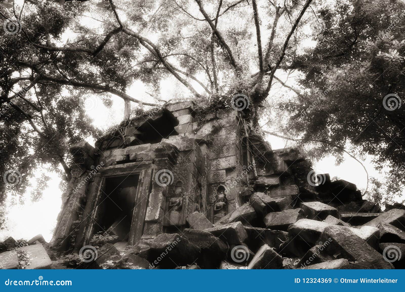 Crumbling Angkor temple stock image. Image of buddhist - 12324369