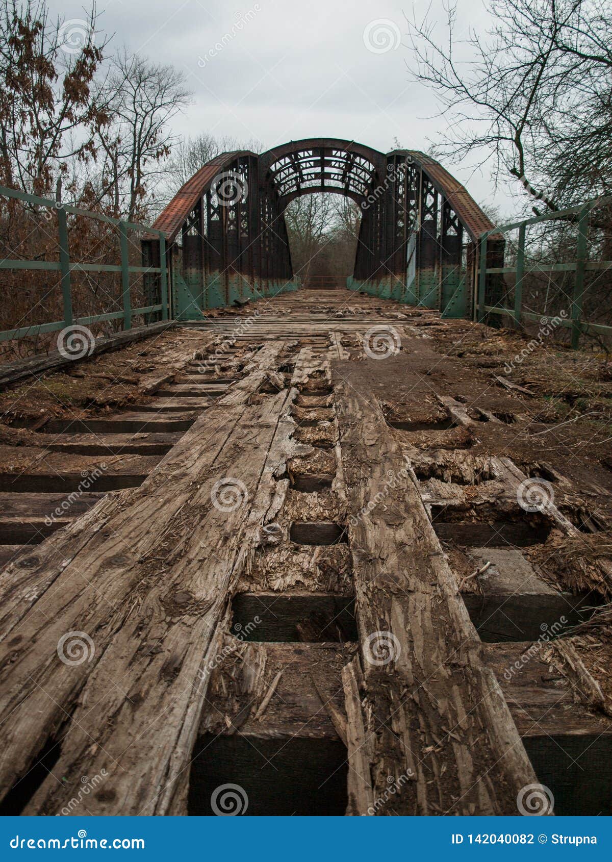 Crumbling Bridge with Broken Wooden Planks and Rusty Steel Stock Photo ...